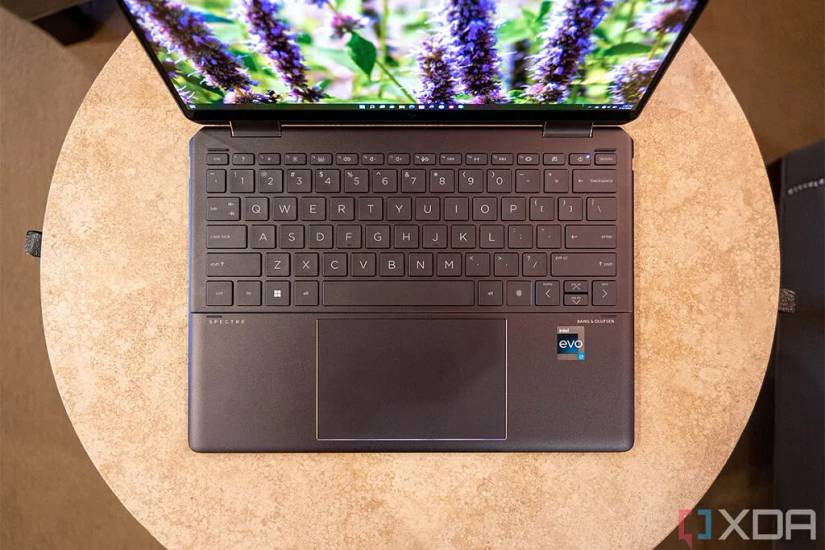 Lenovo Yoga 7i (2023) vs HP Spectre x360: An affordable convertible, or ...