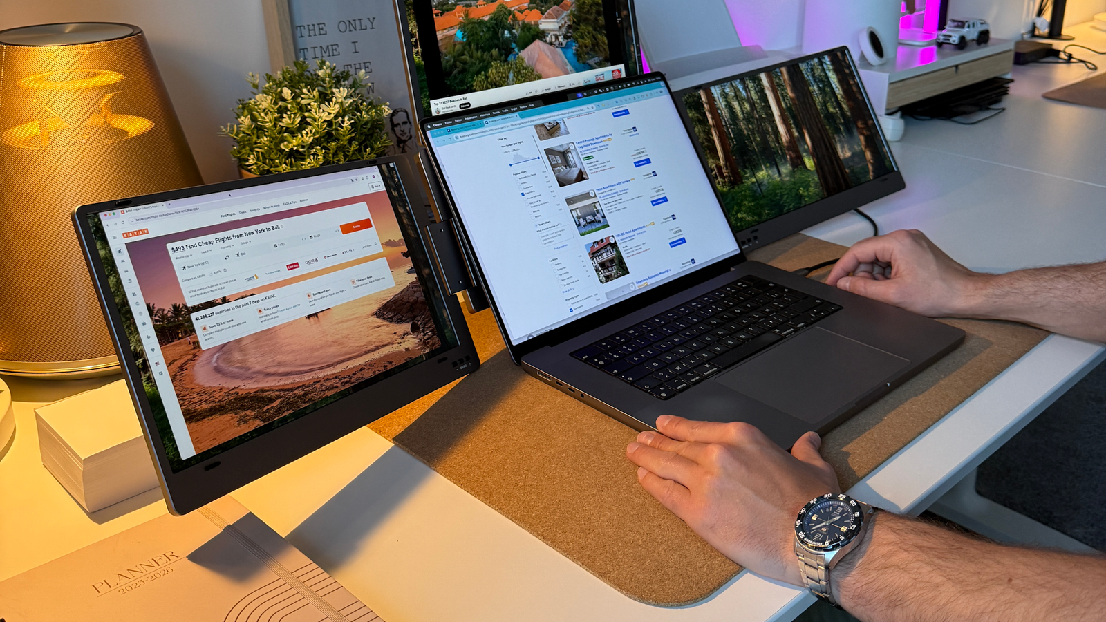 This stand lets you attach three monitors to a laptop via one USB port ...