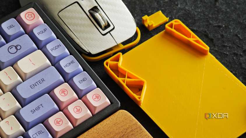 This 3D-printed contraption turns a Logitech MX Master 3 into a left ...