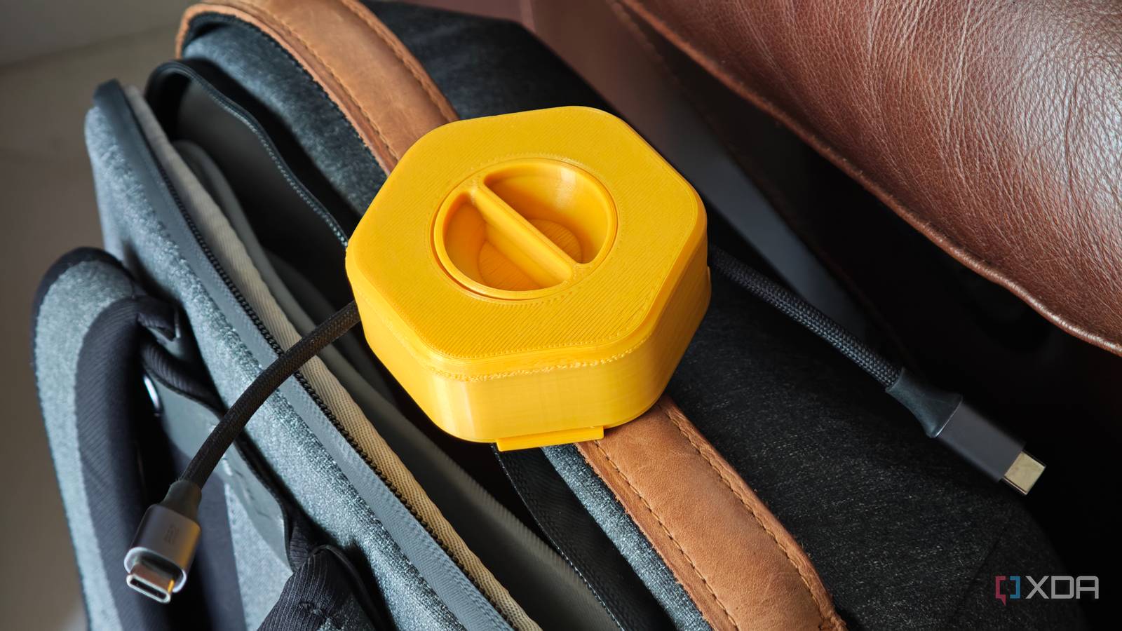 This 3D-printed cable winder reduced the cable clutter in my backpack