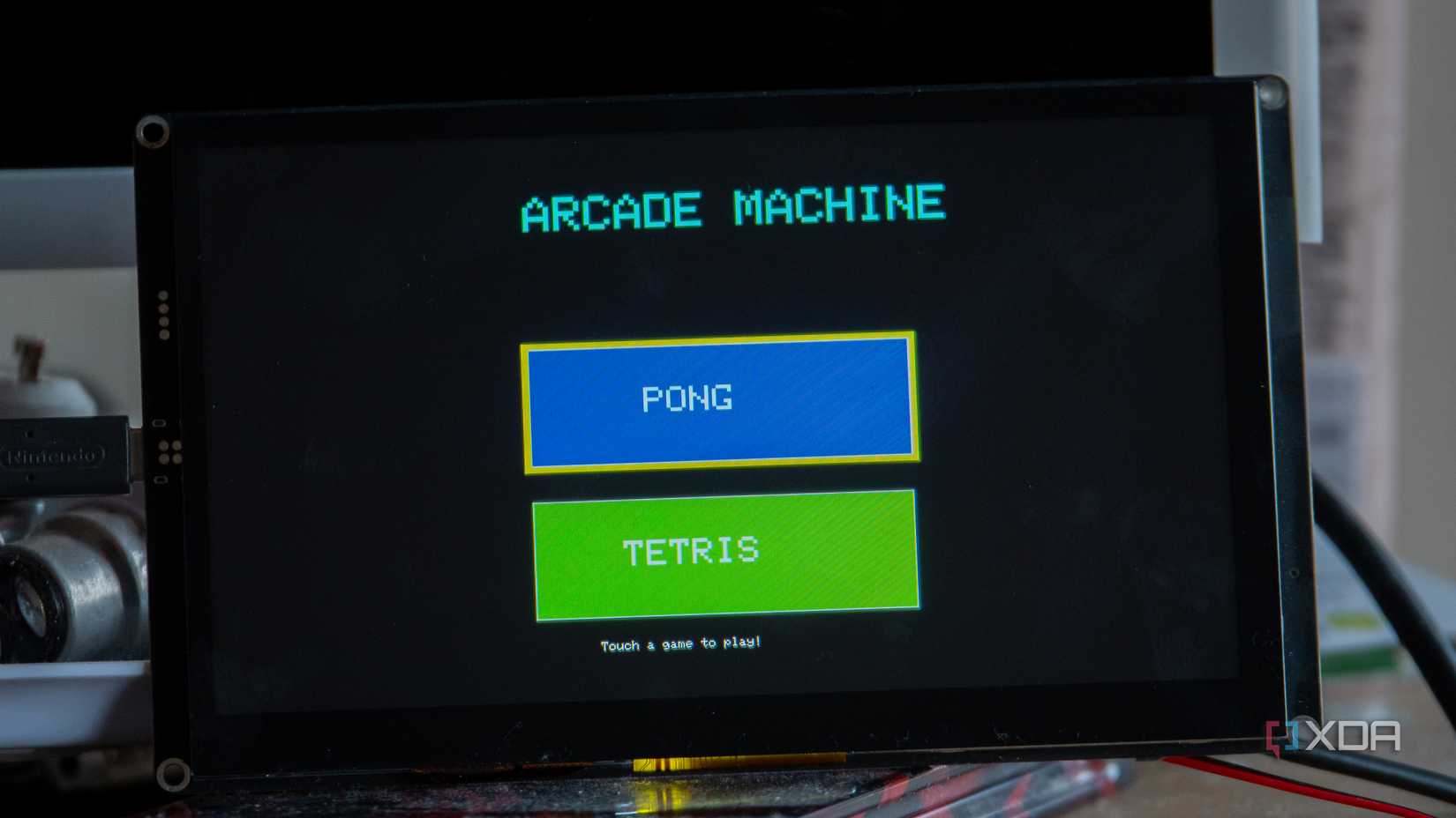 I made a basic arcade machine with this ESP32-powered display